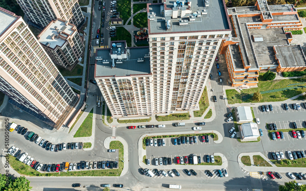 car parking lot near modern high-rise apartment buildings. aerial view ...