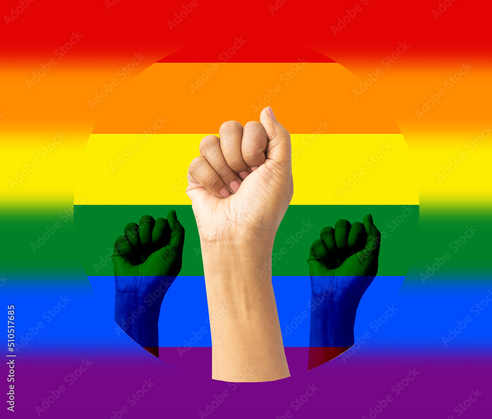 Lgbtq flag and protester hand fight.Pride month.People lgbt rainbow ...