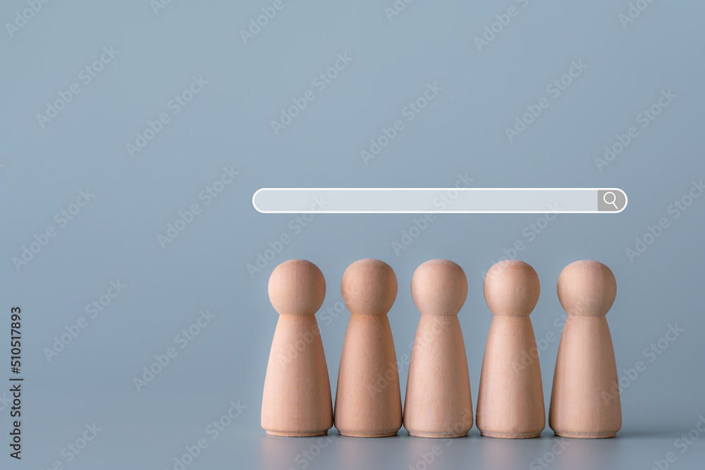 Job search concept in wooden person standing on table. Search browser ...
