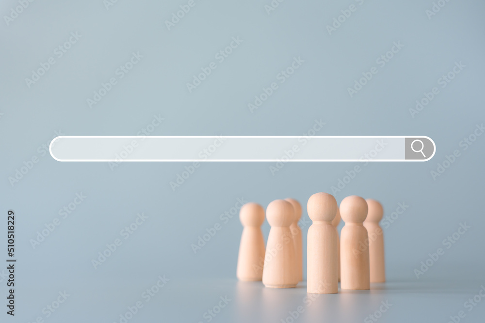 Job search concept in wooden person standing on light blue background ...