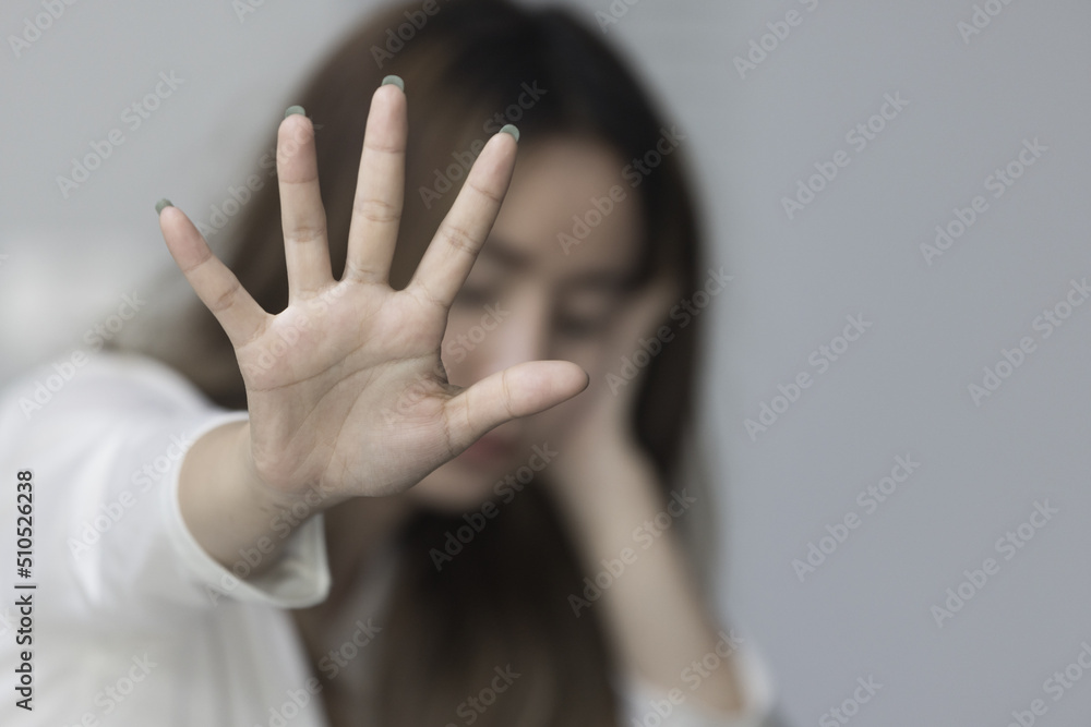 Stop violence against women concept woman raised her hand for dissuade ...
