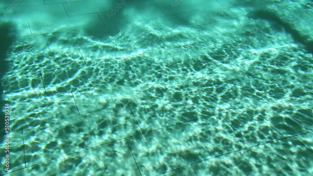Shadow of a Person Swimming Underwater in Swimming Pool with Wave ...