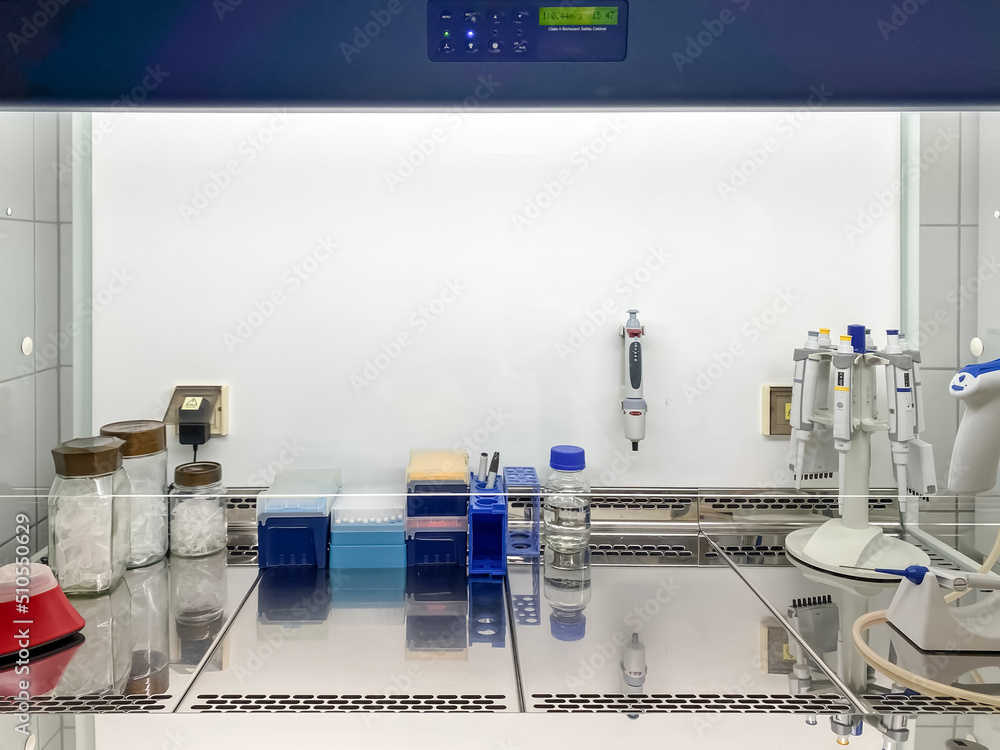 Poster Laboratory equipment used in cell culture (pipette tips with ...