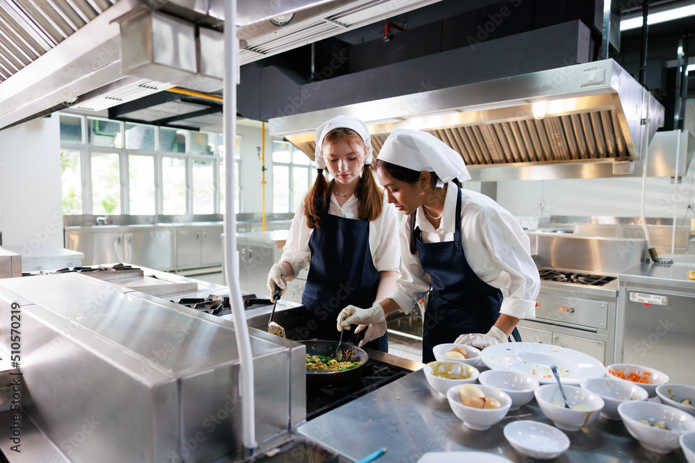 Group of student girl learning. Cooking class. culinary classroom ...