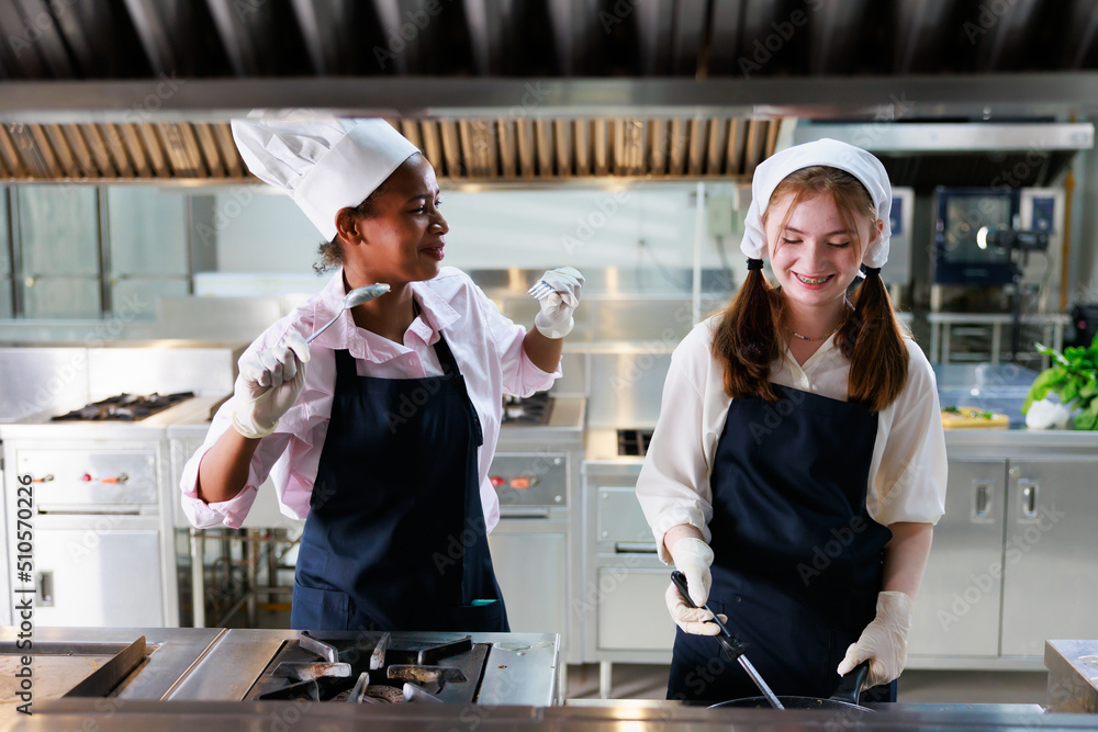 Group of student girl learning. Cooking class. culinary classroom ...