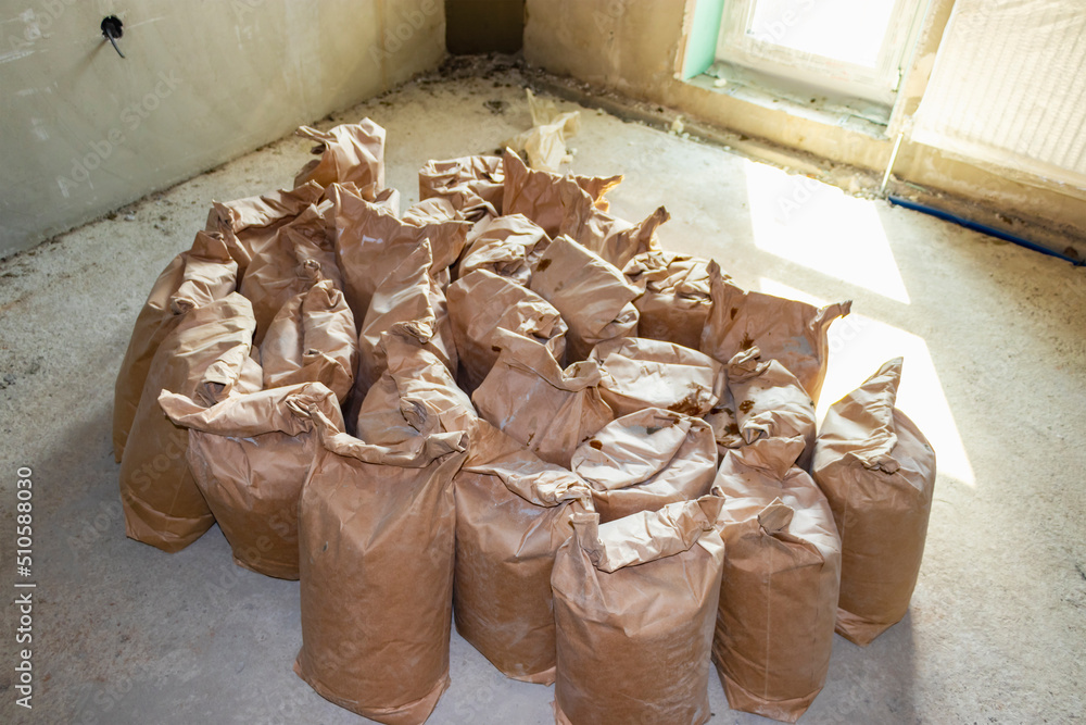 Cement bagBuilding mix bags. Delivery of cement and plaster for works ...