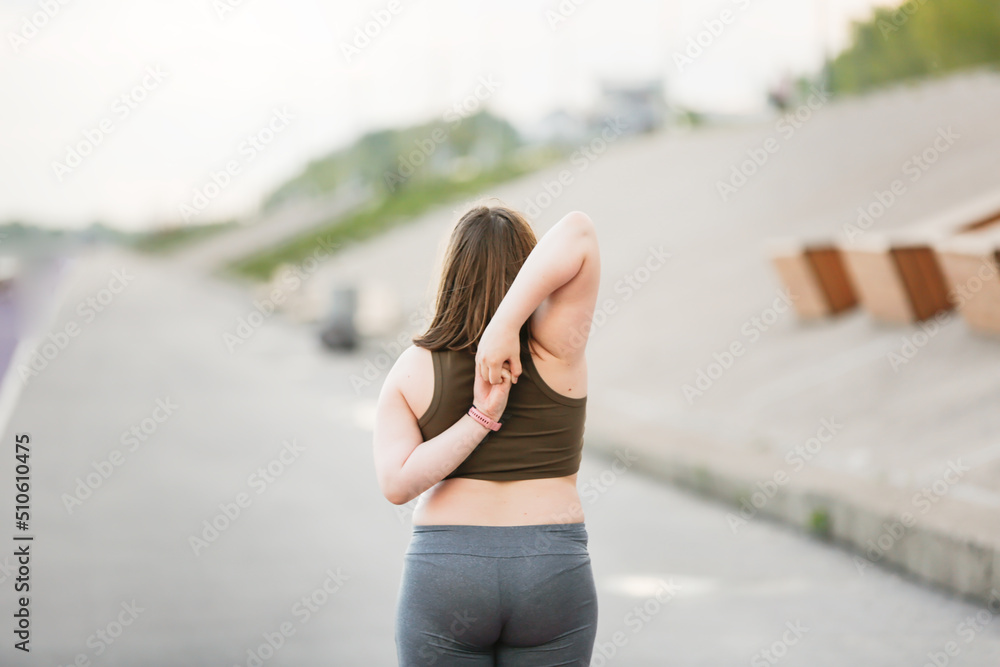 Obese fat kid girl training and exercise at park town on morning ...