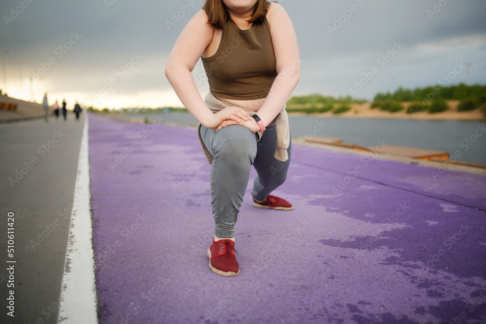 Obese fat kid girl training and exercise at park town on morning ...