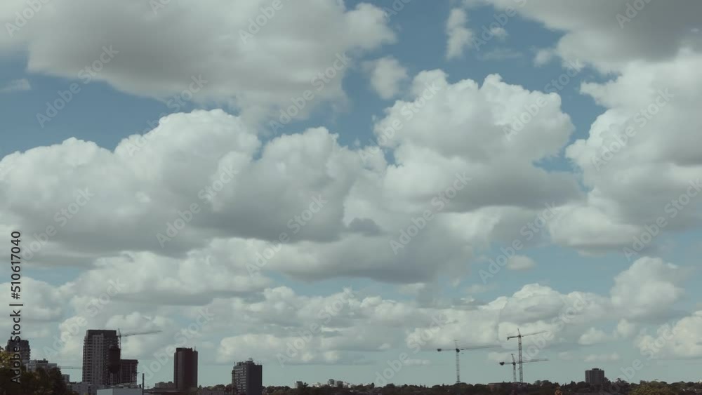 Extreme ultra wide view of the Toronto skyline on a day with puffy ...