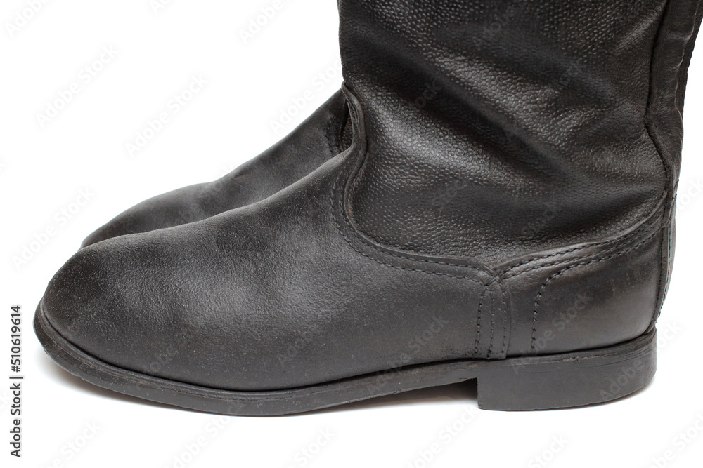 Side view of old military boots made of leather on white background ...