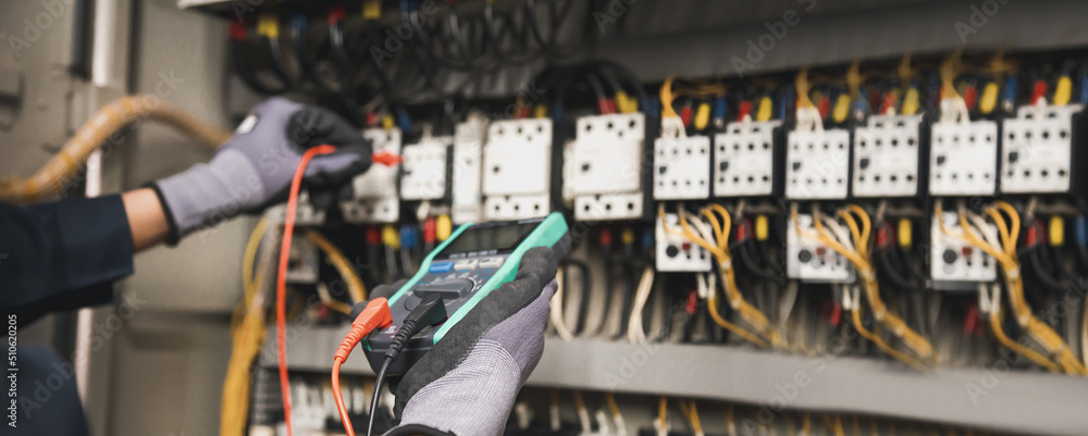 Electricity and electrical maintenance service, Engineer hand holding ...