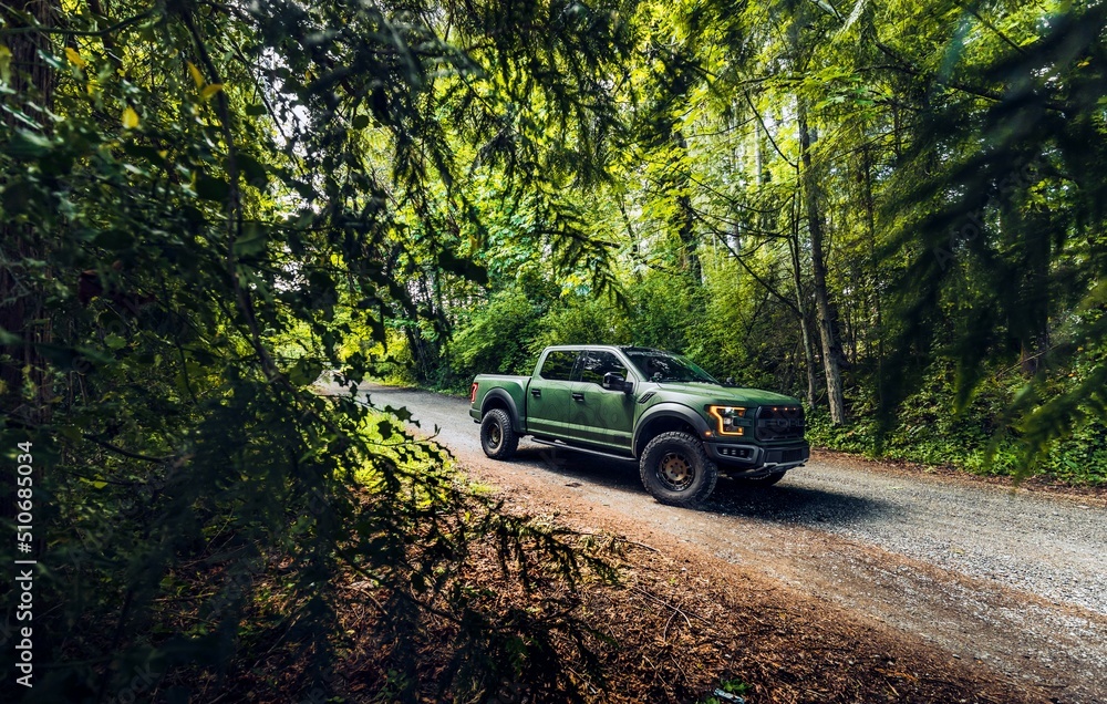 Seattle, WA, USA March 1, 2022 Green Ford Raptor with a vinyl wrap ...
