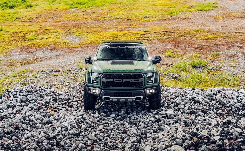 Seattle, WA, USA March 1, 2022 Green Ford Raptor with a vinyl wrap ...