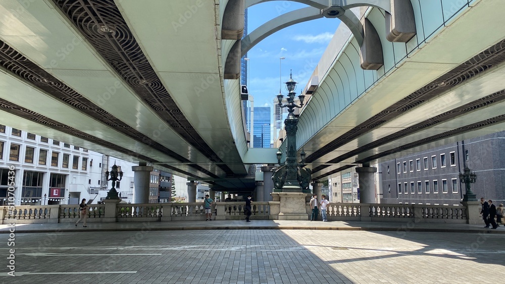 The curves and arcs of highway overhead the Nihonbashi bridge and the ...
