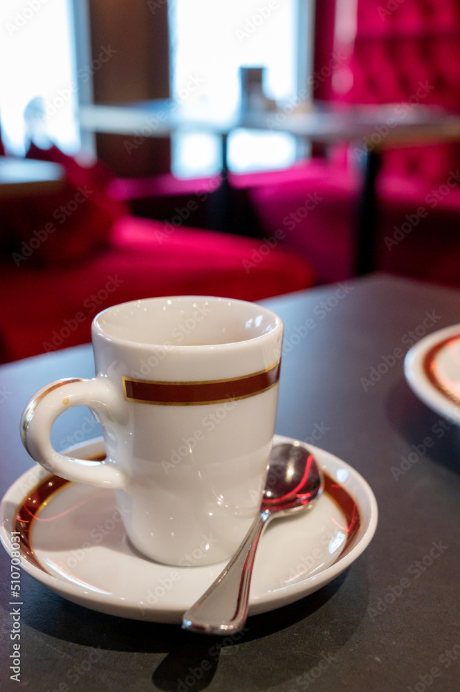 Small cup of black espresso coffee served in traditional cafe in Vienna ...