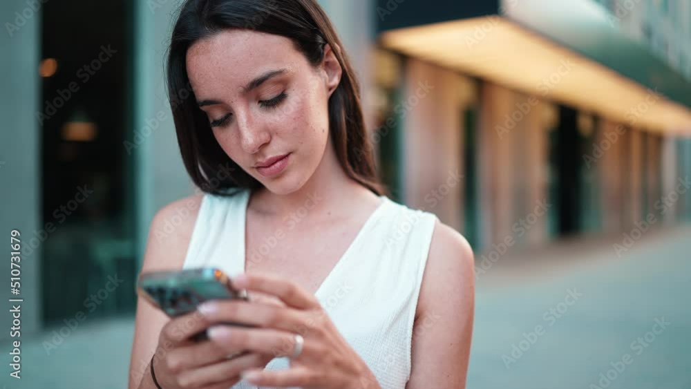 Vidéo Stock Beautiful woman with freckles and dark loose hair wearing ...