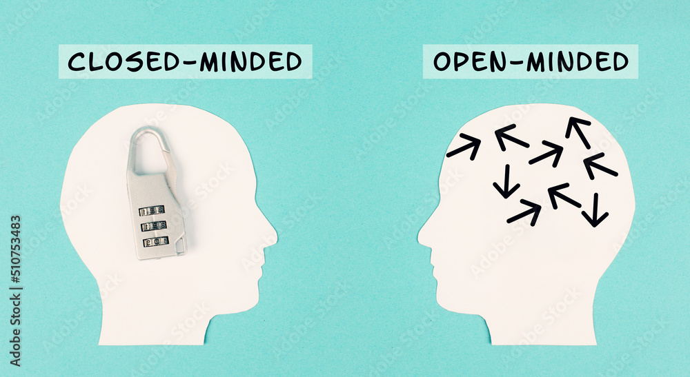 Silhouette of two people, one man is closed minded with a lock in his head, opposite to the ...