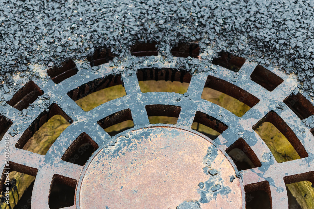 Cast iron storm sewer manhole. Close-up. View from above. drainage ...