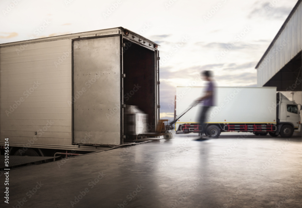 Blur Motion of Workers Unloading Cargo Pallets to The Cargo Container ...