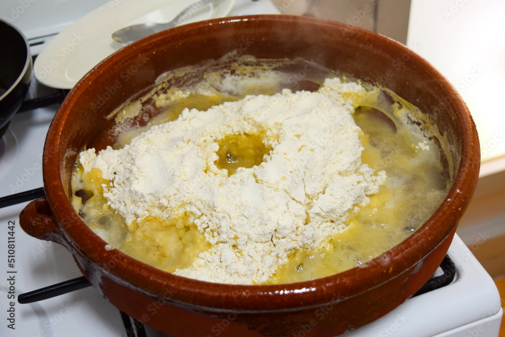 "Las Gachas" are a dish that is made by cooking wheat or corn flour, a ...