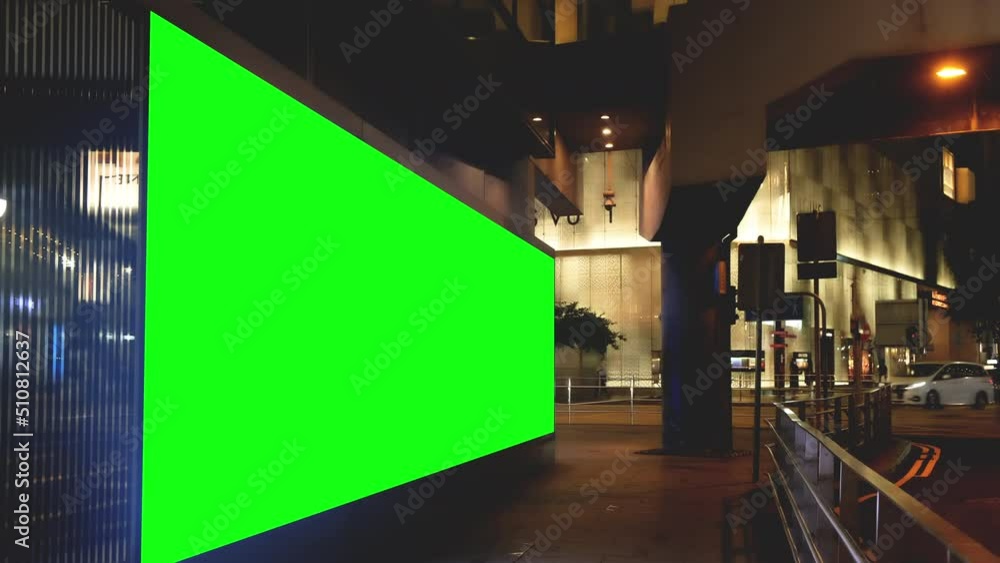 Billboard with green screen on street at night. Stock Video | Adobe Stock