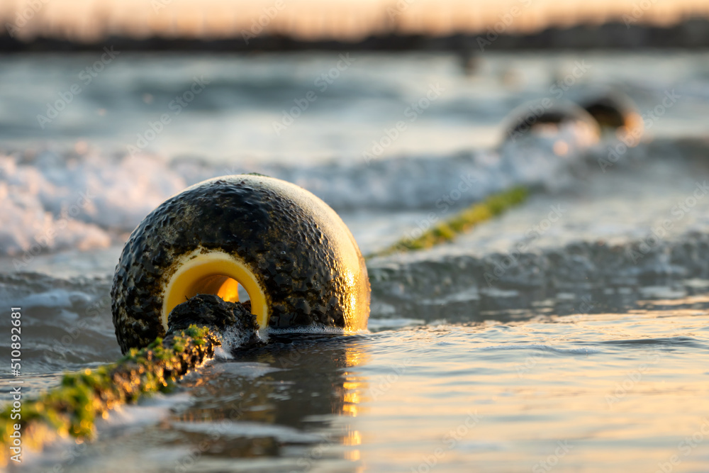Floating ball buoys that limit safe areas in the water for swimming ...