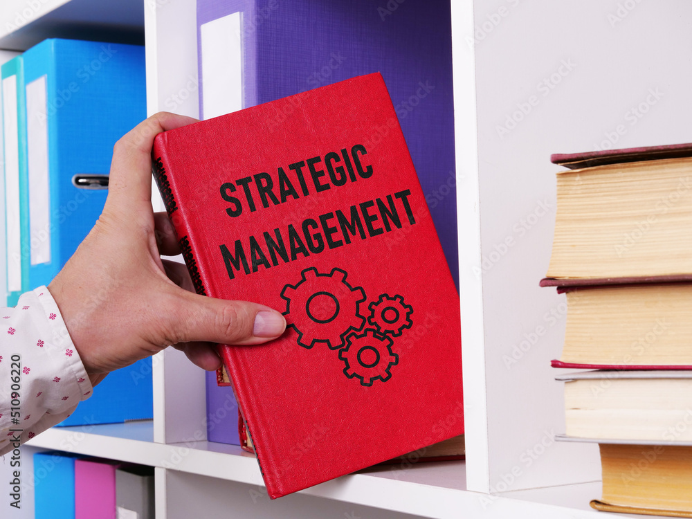 Strategic management is shown using the text Stock Photo | Adobe Stock