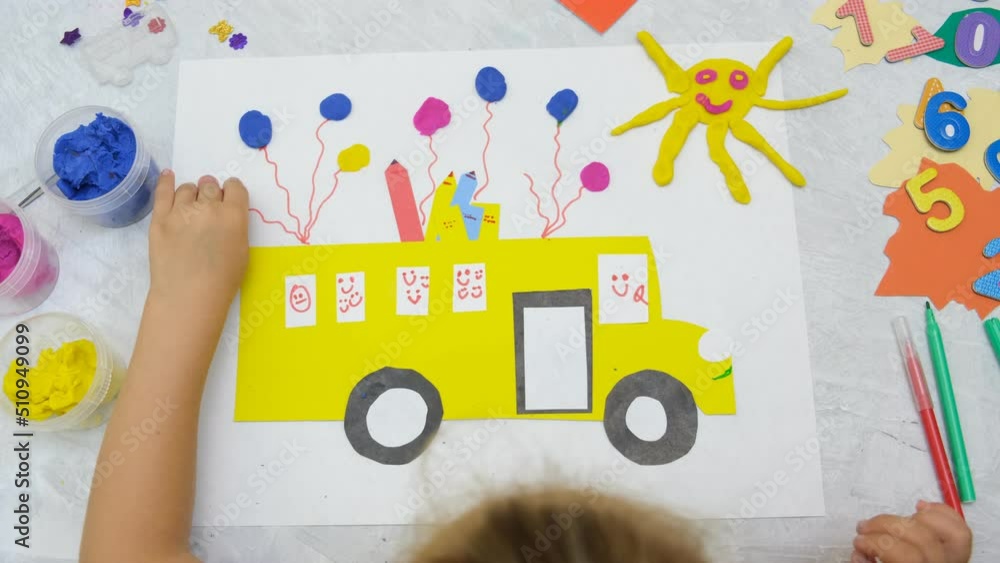 Child making school bus from paper and plasticine. DIY. Back to school ...