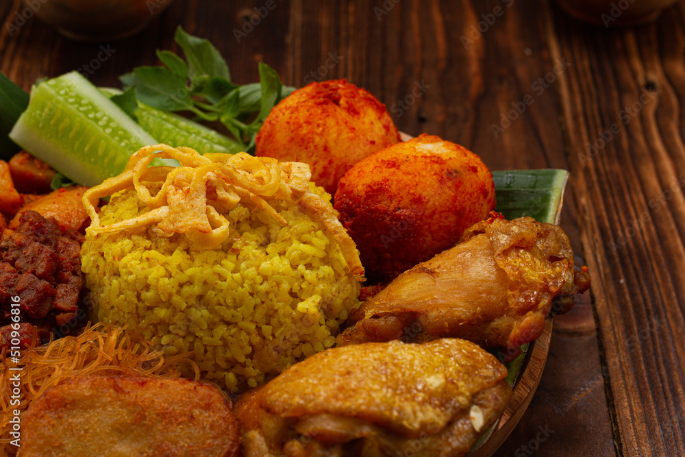 Nasi Kuning, traditional food from Indonesia. Closeup. Stock Photo ...