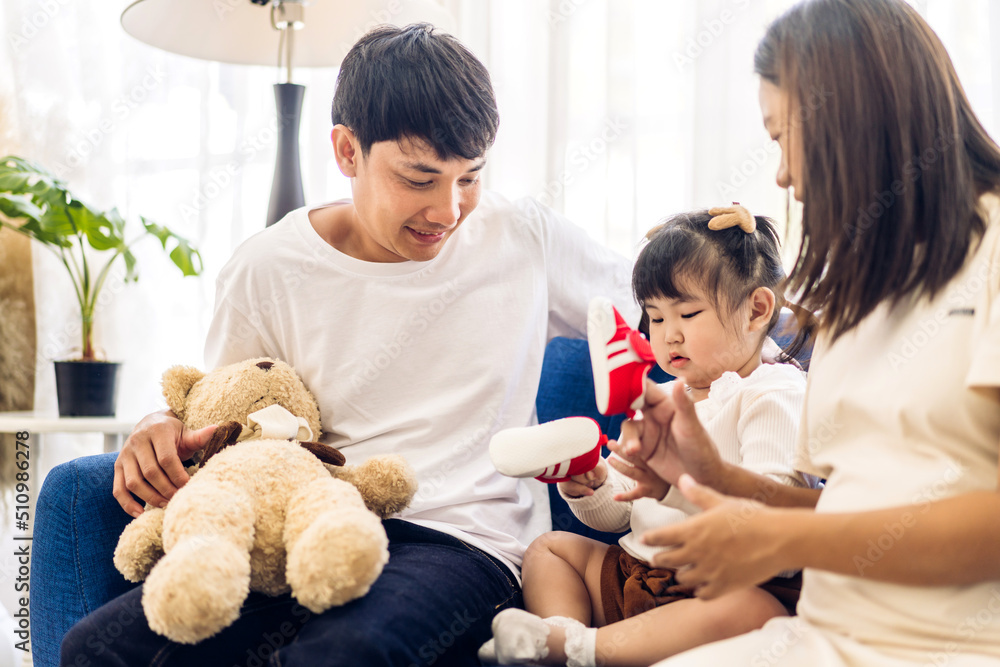 Portrait of enjoy happy love asian family father and mother holding hug ...