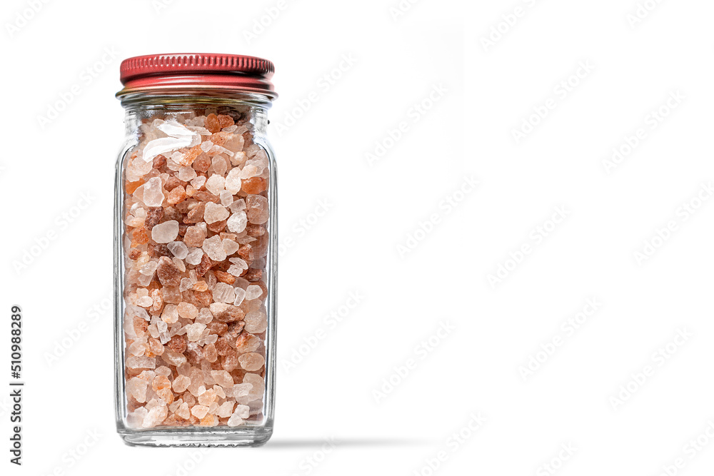 Himalayan pink salt in Spice Rack Glass bottle with red cap isolated on ...