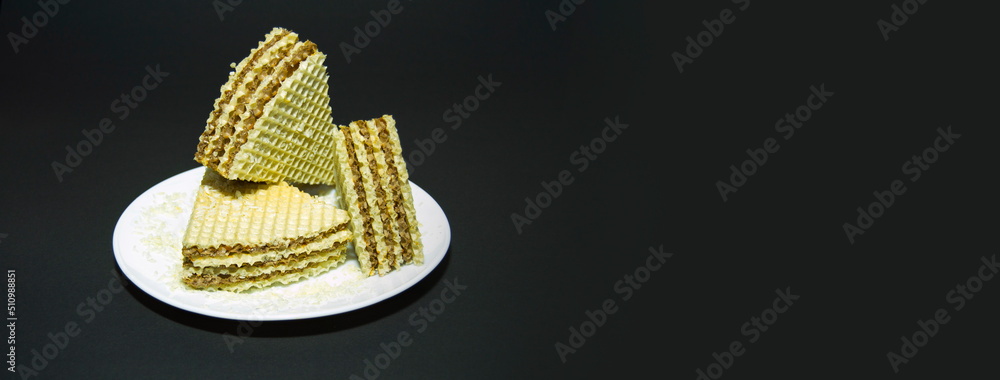 waffle cake on a white plate. black background. plate on black waffle ...