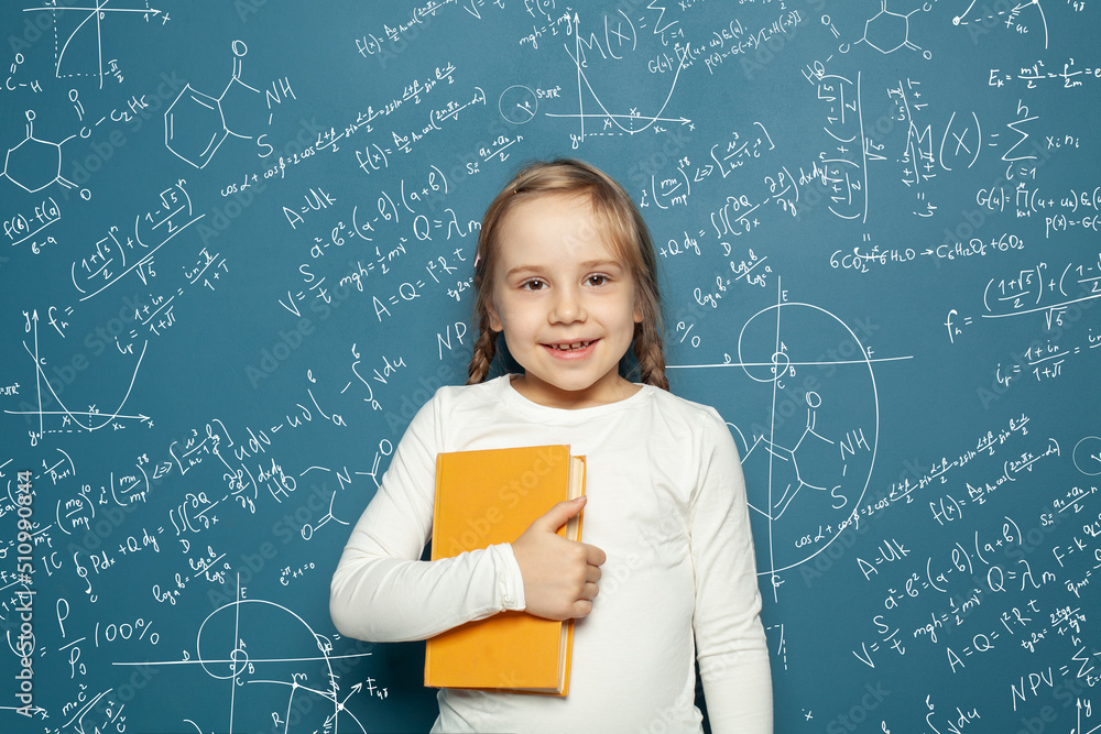 Cute curiosity little girl mathematics student on blue school ...