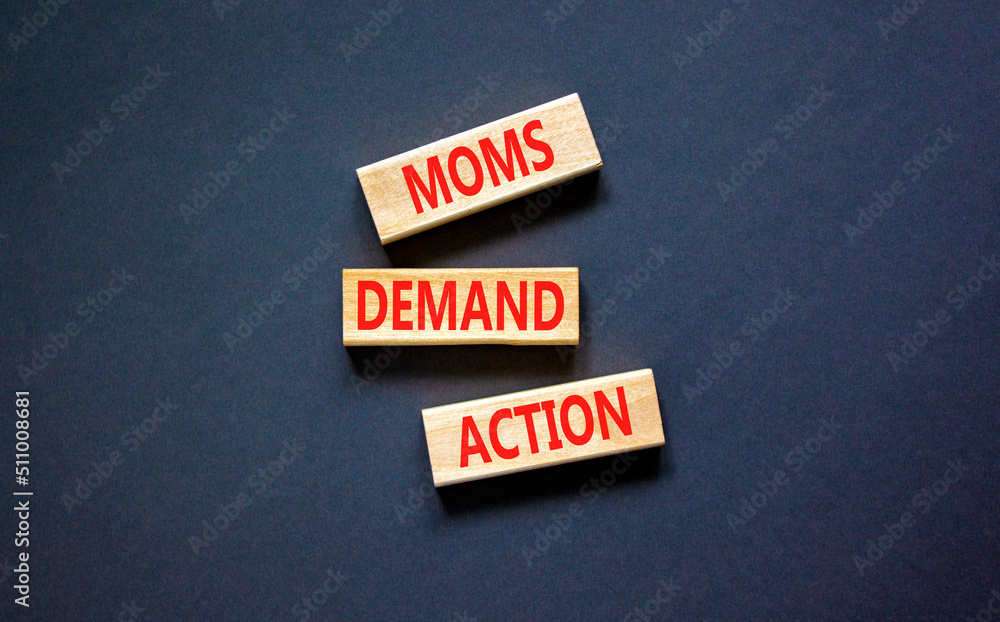 Moms demand action symbol. Concept words Moms demand action on wooden ...