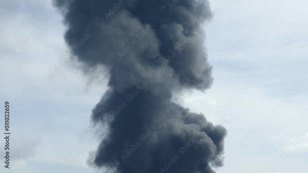 A giant fire and a high column of black smoke after the explosion at ...