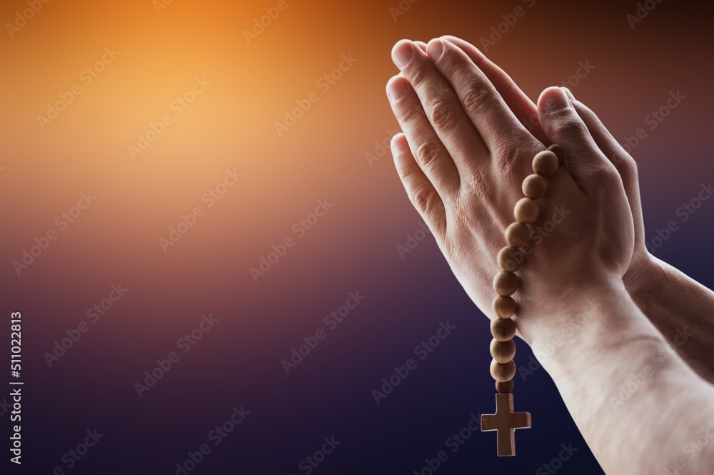 The boy folding his hands in prayer to god. prayer to God for happiness ...