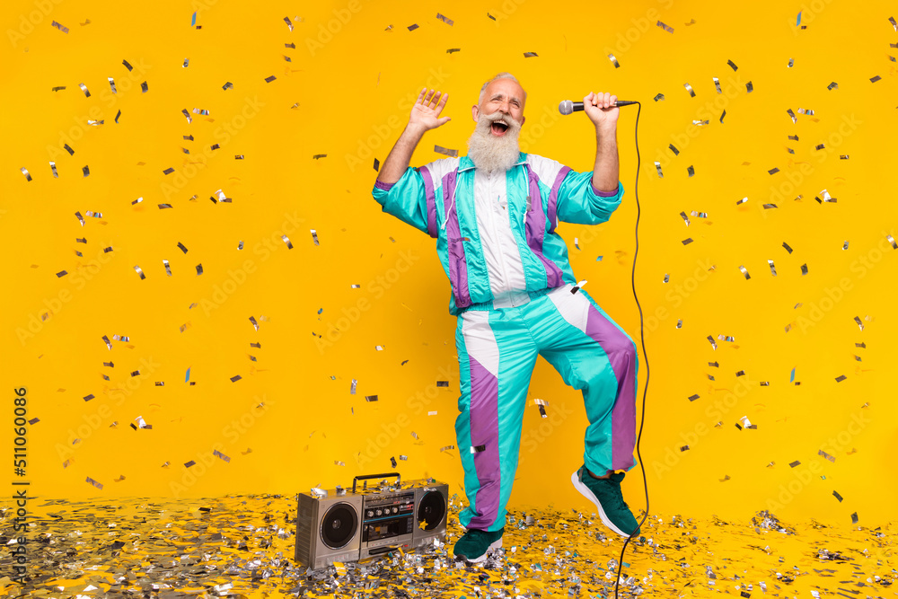 Full size photo of positive funky granddad arm hold microphone have fun ...