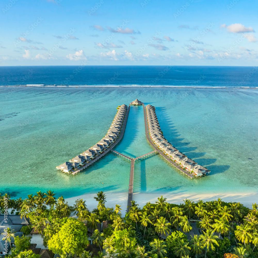 Maldives. Tropical beach and water bungalows. Travel and tourism to ...