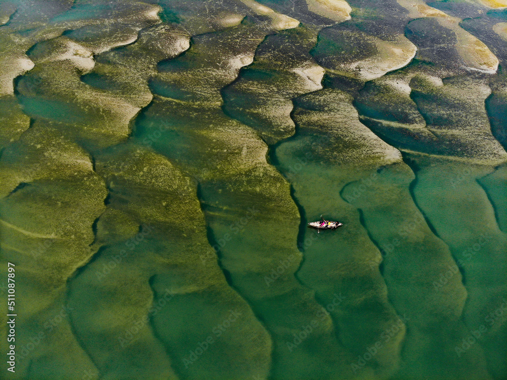 Huge sandbars arise in river Jamuna when the water level drops during ...