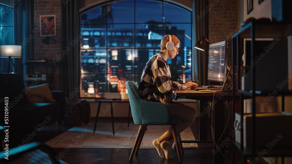 Young Woman Writing Code on Desktop Computer in Stylish Loft Apartment ... Young Woman Writing Code on Desktop Computer in Stylish Loft Apartment ...
