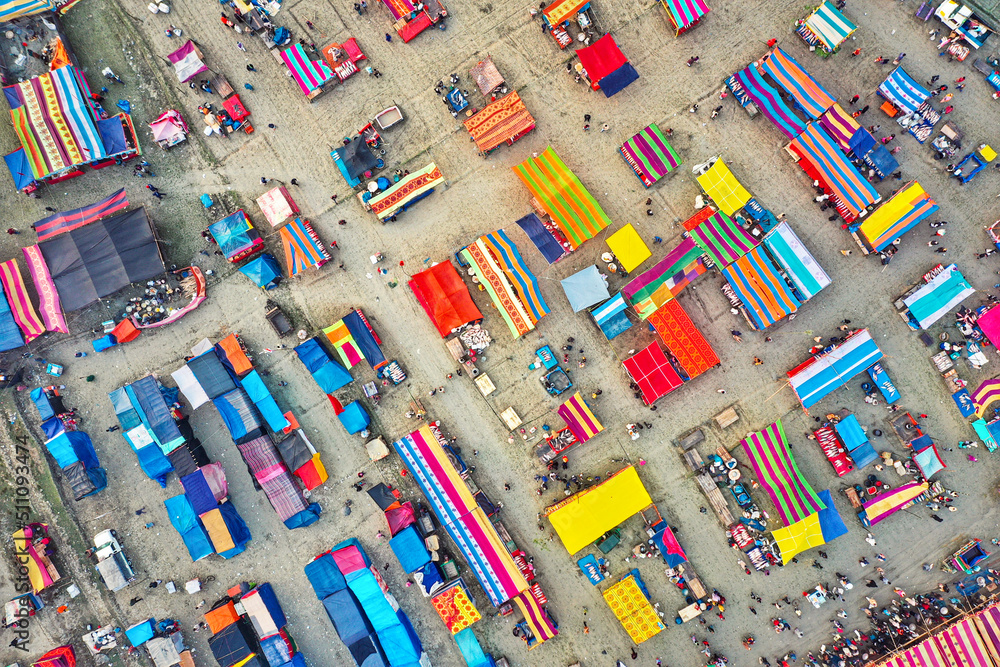 Aerial view of traditional village fair in Bangladesh. Colorful tents ...