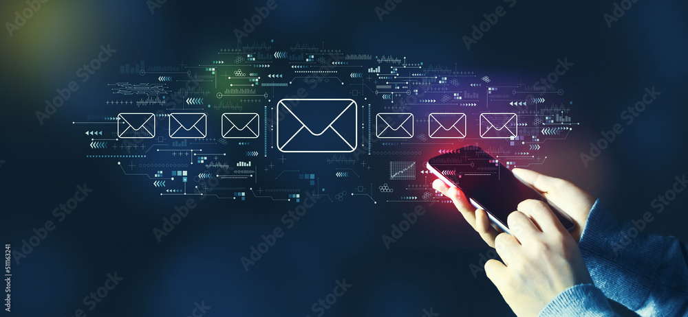 Email concept with person using a smartphone Stock Photo | Adobe Stock