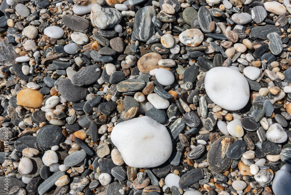 Pebbles on a beach on the west coast of the South Island, New Zealand ...