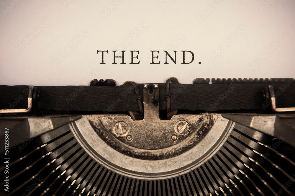The end text typed on an old vintage typewriter. Conceptual Stock Photo ...