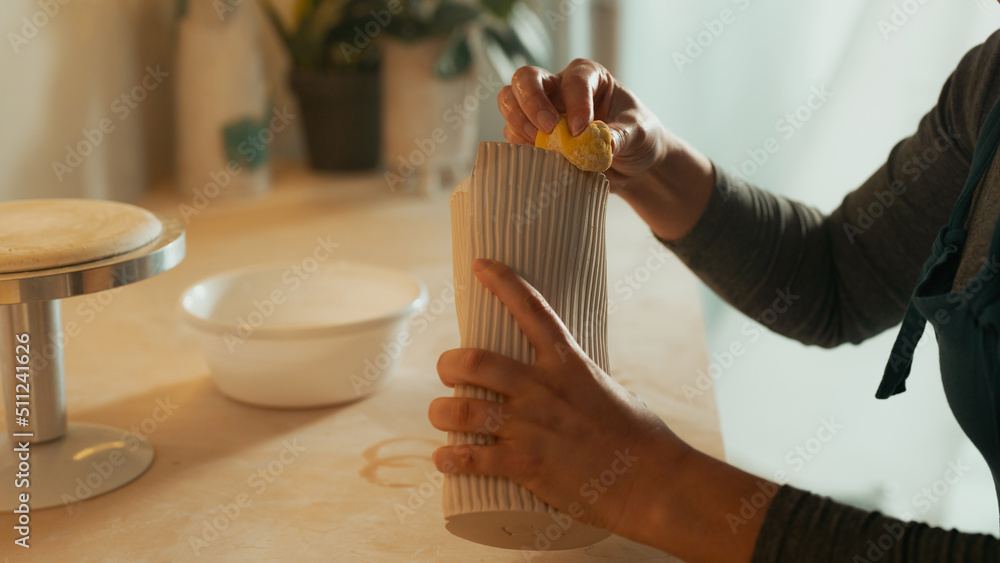 Detailed Frame of Caucasian Woman's Hands Holding a Clay Vase While She ...