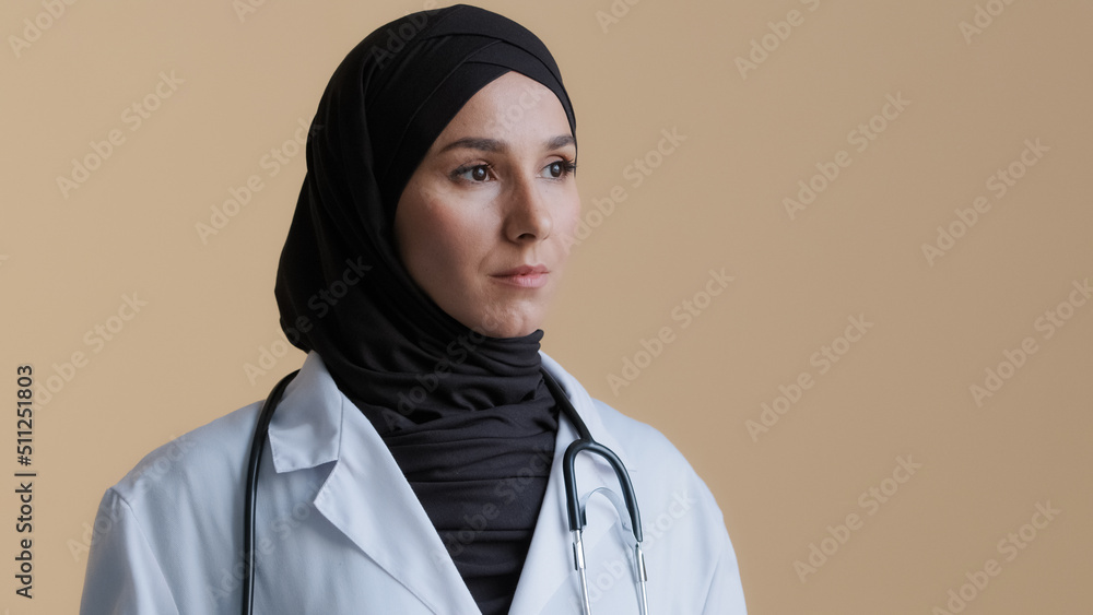 Portrait of pensive upset muslim arabian young woman doctor islamic ...