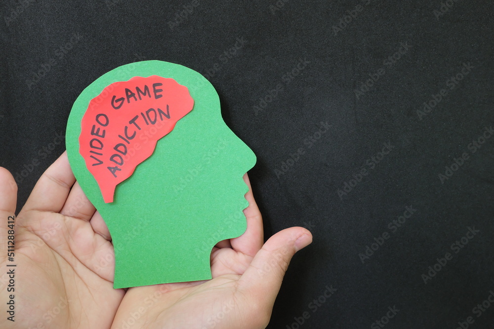 Video game addiction treatment and how to deal with concept. Hand ...