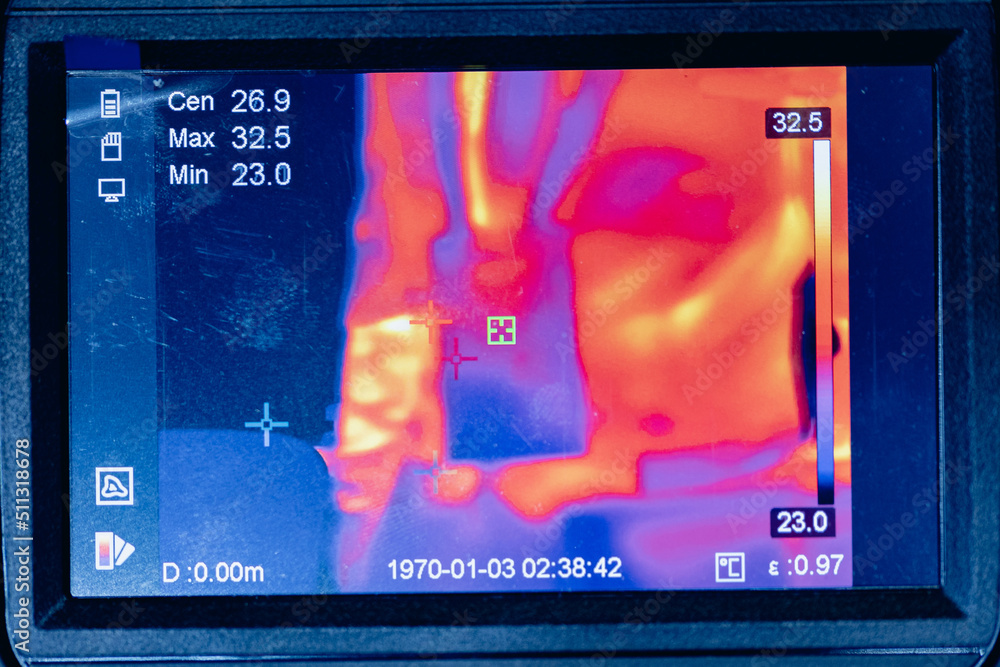 Worker use thermal IR imaging camera to check temperature for ...