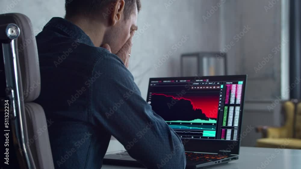 Cryptocurrency Trader at his Workplace in front of a Computer. Laptop ...