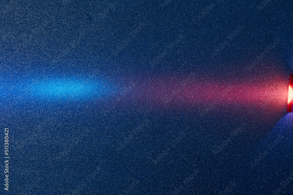 On a blue gradient background in white grain red and light blue rays of ...